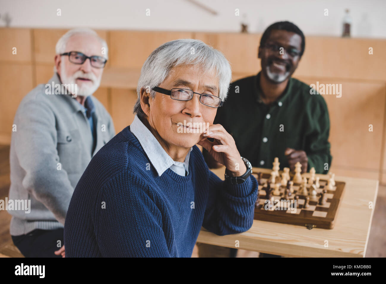 senior friends playing chess Stock Photo - Alamy