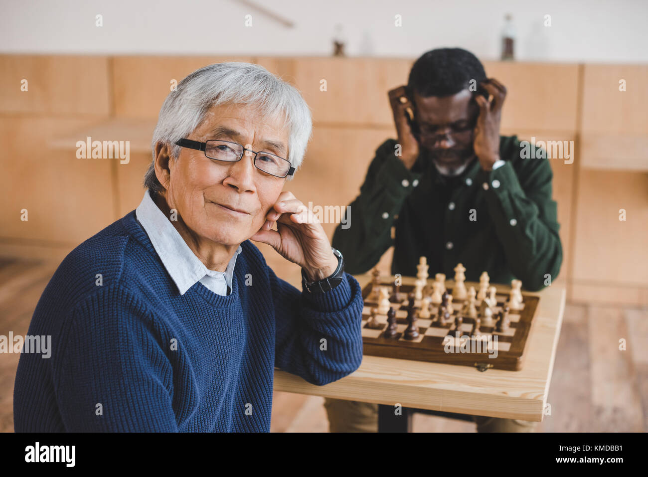 asian man playing chess Stock Photo - Alamy
