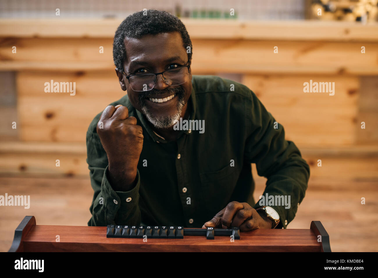 man celebrating victory in kicker Stock Photo - Alamy