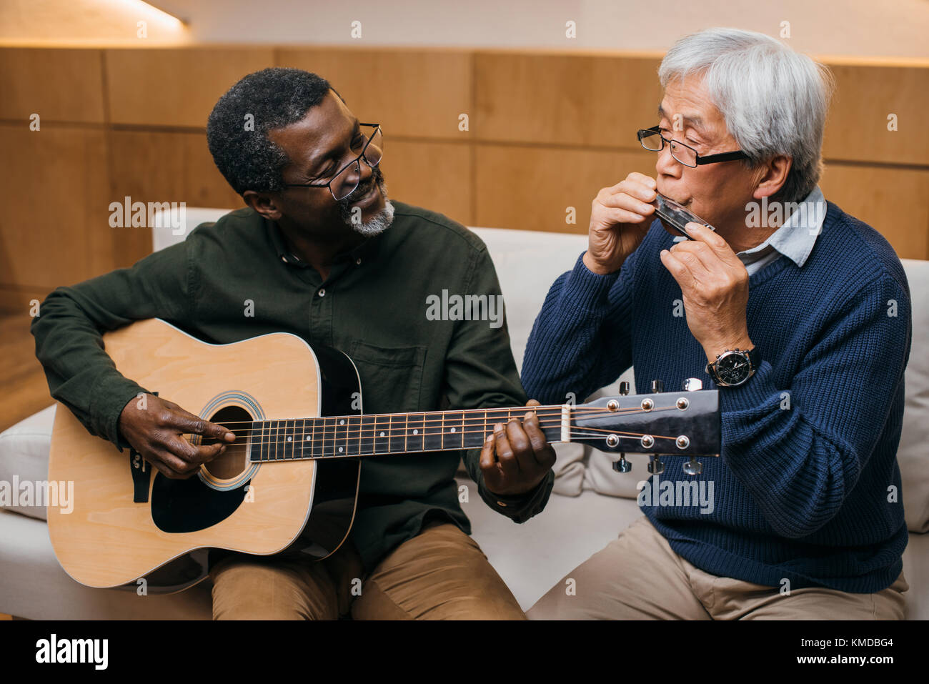 senior friends playing music Stock Photo - Alamy