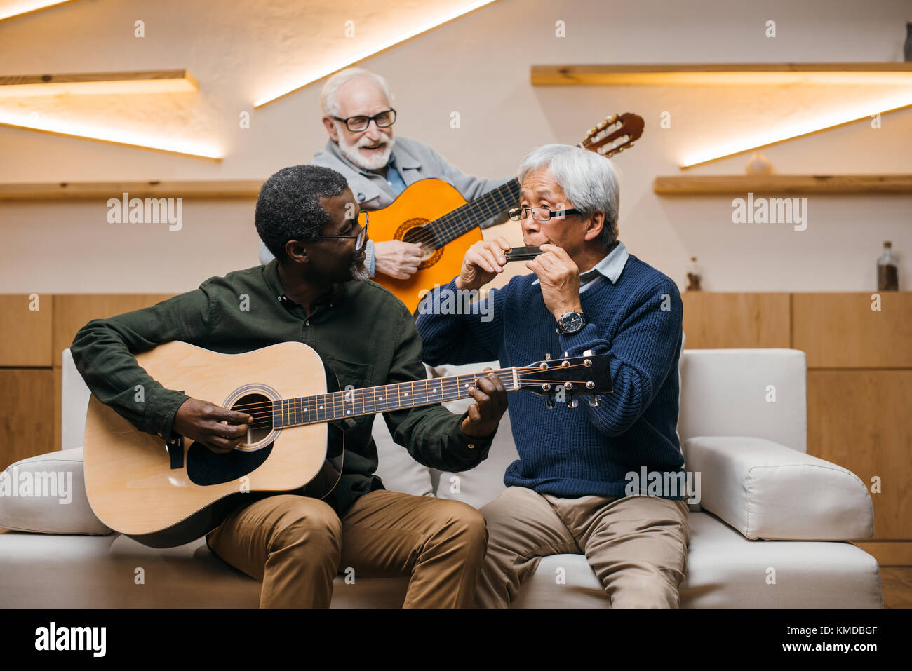 senior friends playing music Stock Photo - Alamy