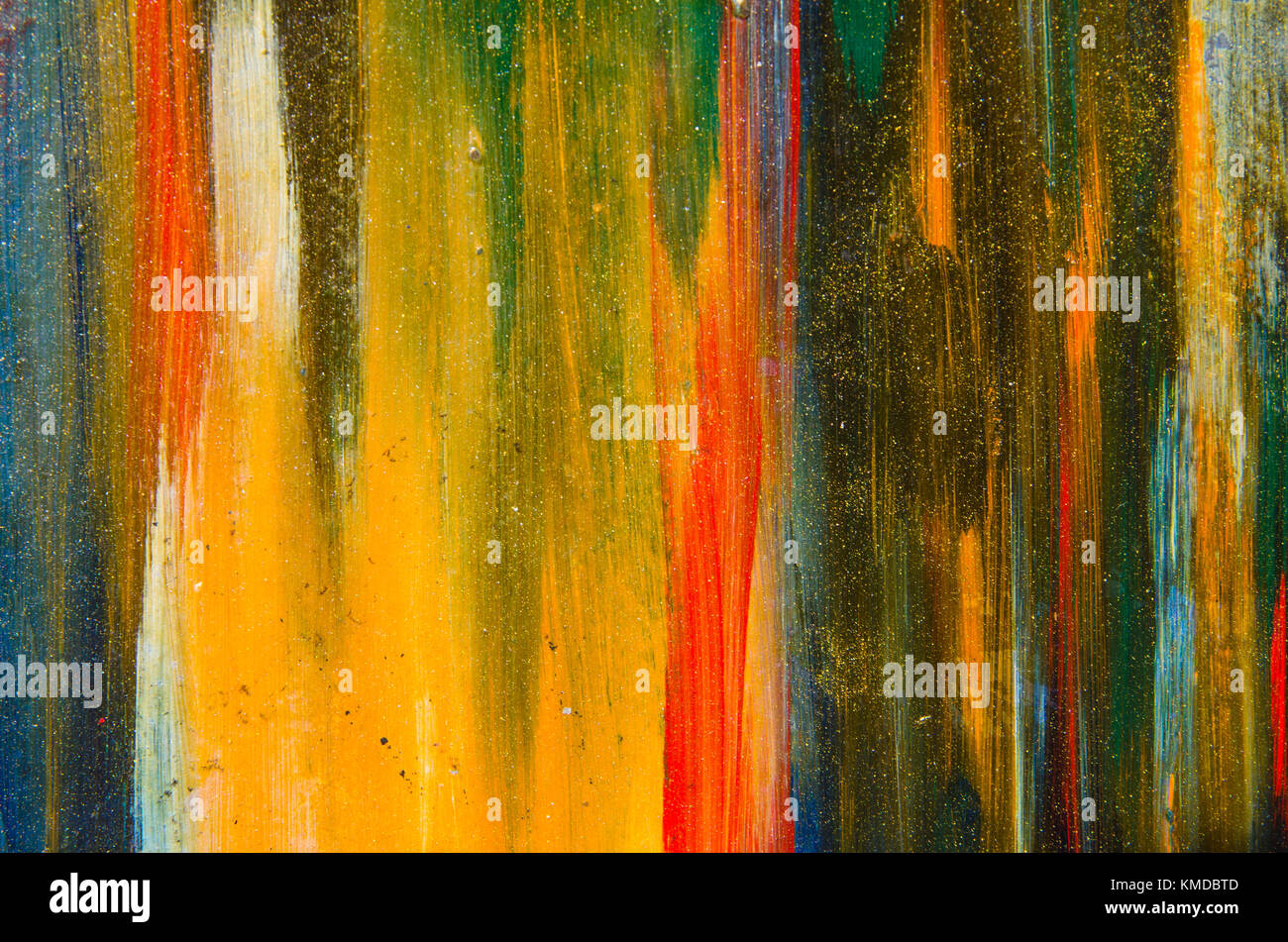 Long yellow smears of watercolor paint on canvas. Slim smears of brown ...