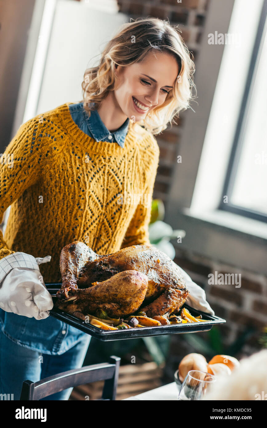 Young woman carrying tray hi-res stock photography and images - Alamy