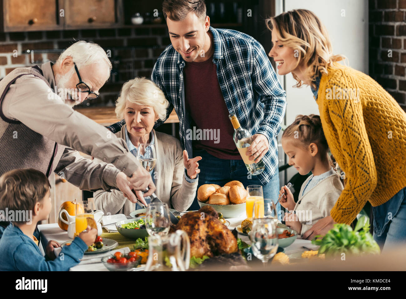 Father son having dinner table hi-res stock photography and images - Alamy