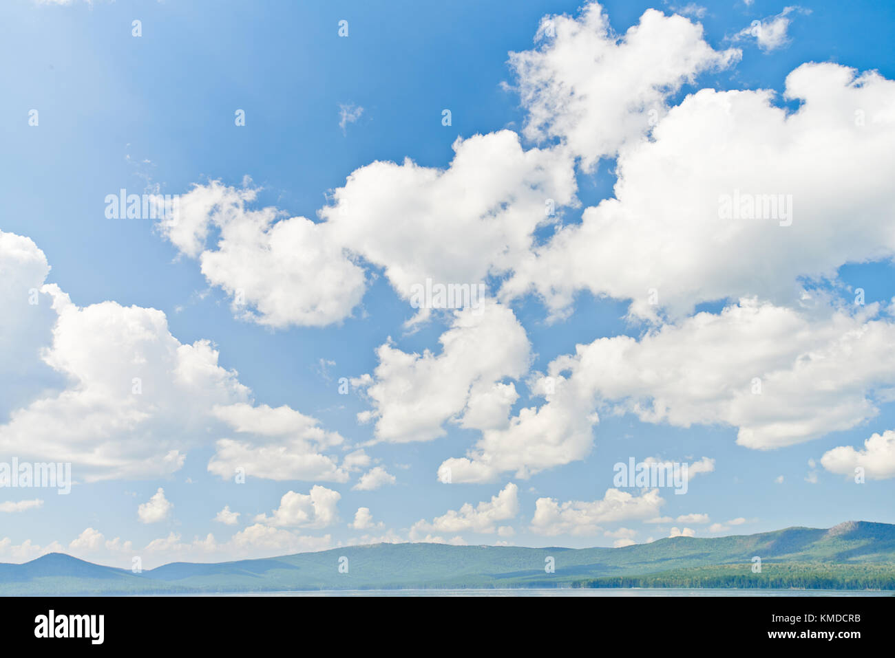 Cloudy sky over mountains outside Stock Photo - Alamy