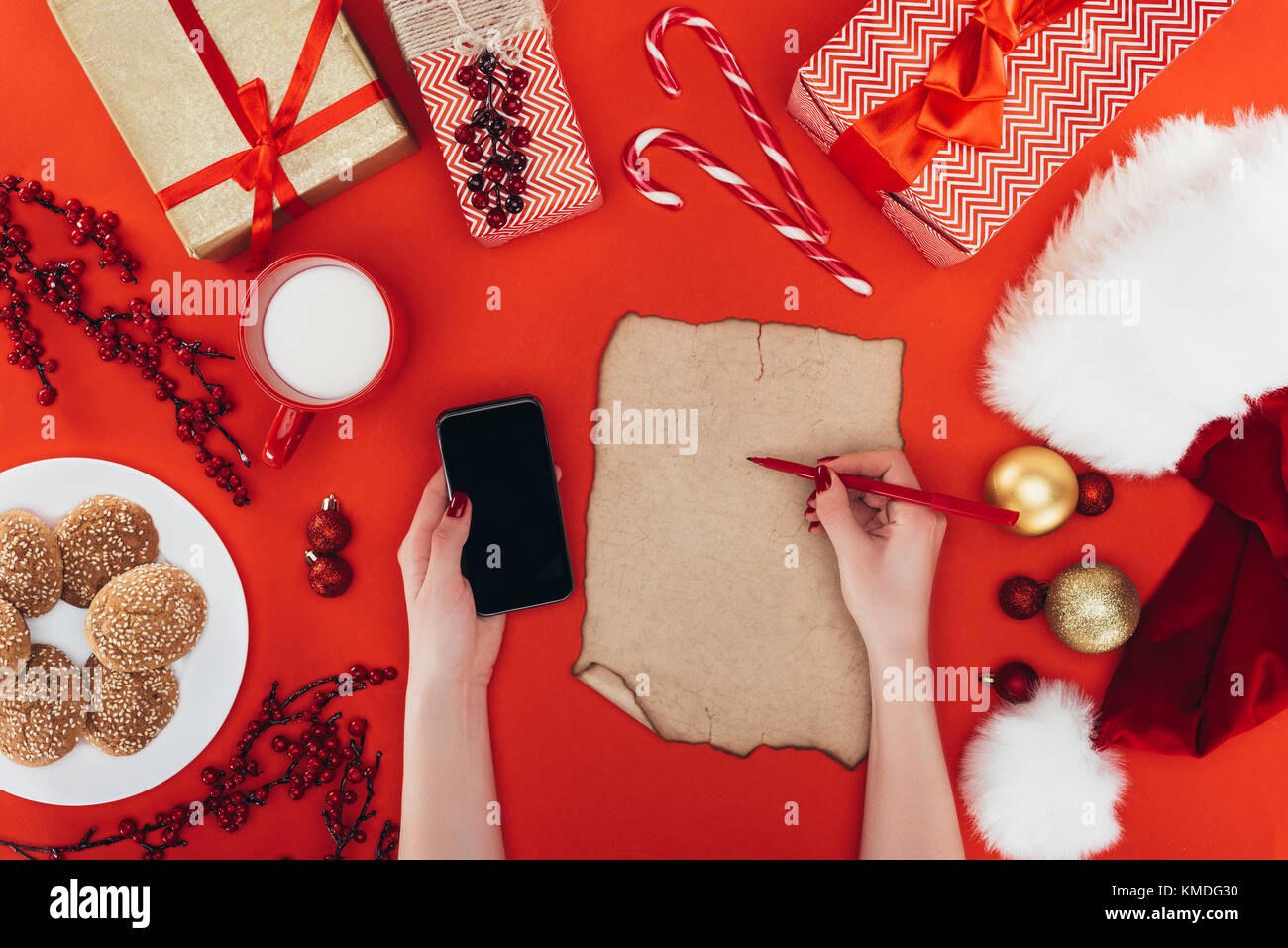 woman writing present list Stock Photo - Alamy