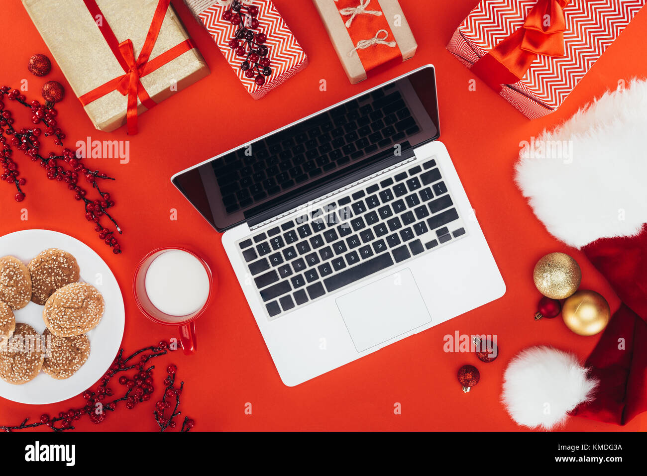 christmas gifts and laptop Stock Photo - Alamy