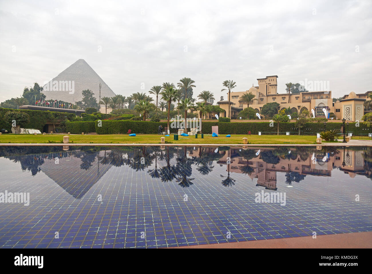 The Pyramids reflected in the hotel pool at the Mena House Hotel, Giza ...