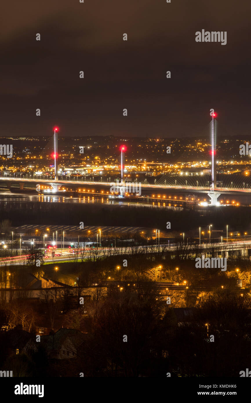 Light trails from rush hour traffic crossing the Mersey Gateway Toll ...