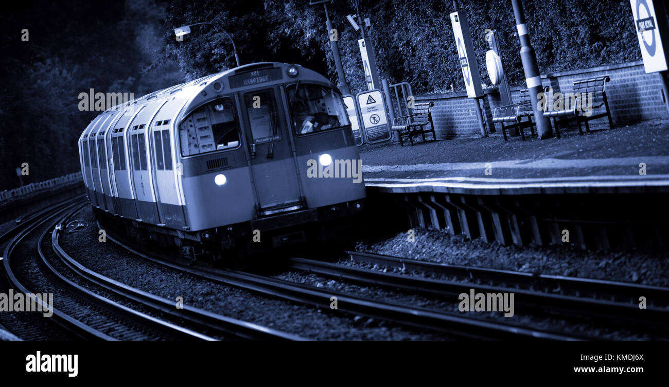 A London Underground Service heading to Uxbridge passing through Park ...