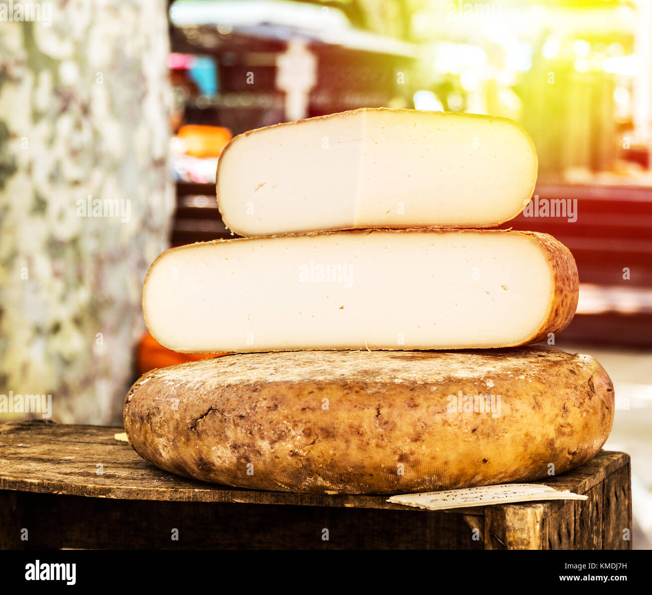 Different cheeses at open air-market Stock Photo - Alamy