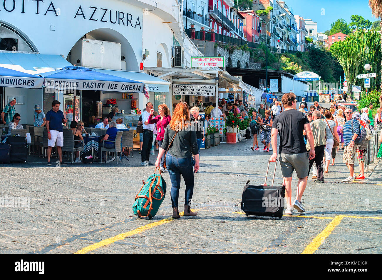 Capri, Italy - October 3, 2017: Tourists with luggage bags on Capri ...
