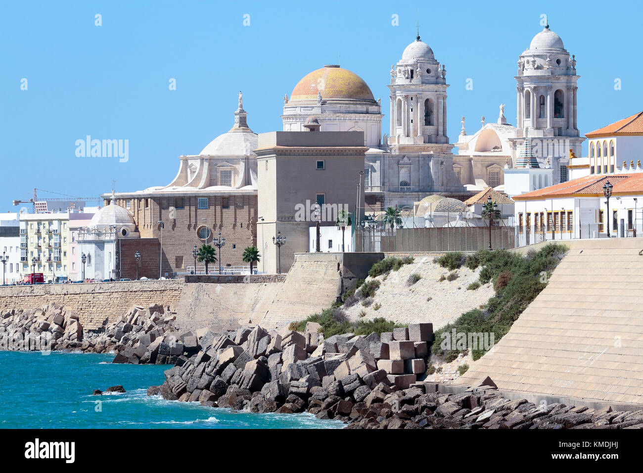 horizontal view of cadiz cathedral from the seawall Stock Photo - Alamy
