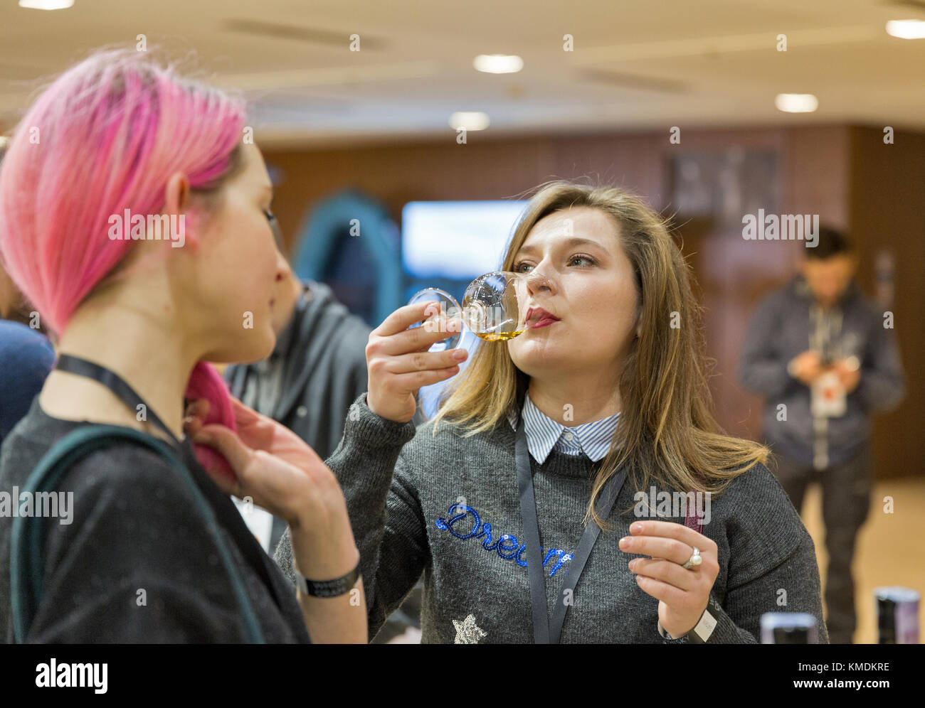 Woman tasting whisky hi-res stock photography and images - Alamy