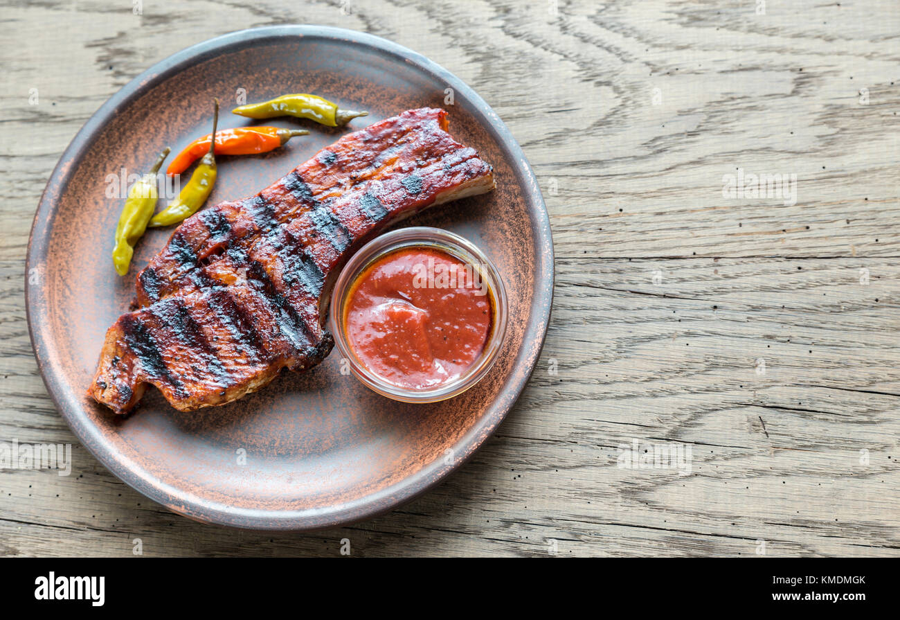 Portion of grilled pork ribs Stock Photo - Alamy