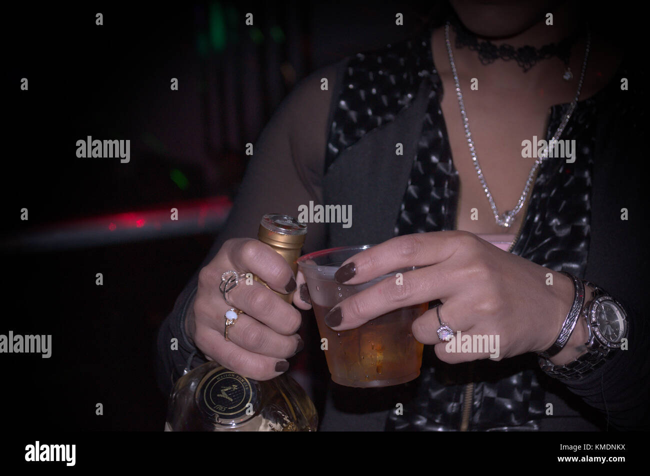 bartender woman mixing a drink Stock Photo - Alamy