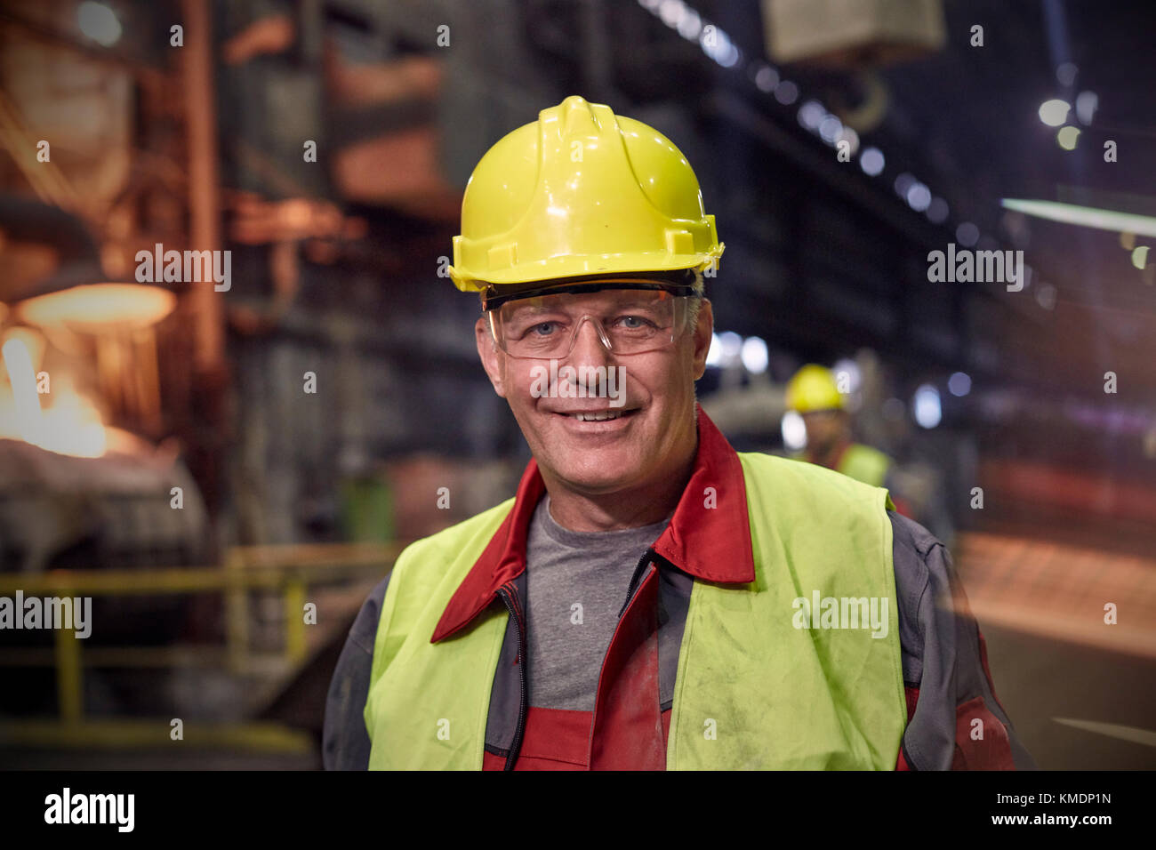 Portrait smiling,confident steelworker in steel mill Stock Photo - Alamy