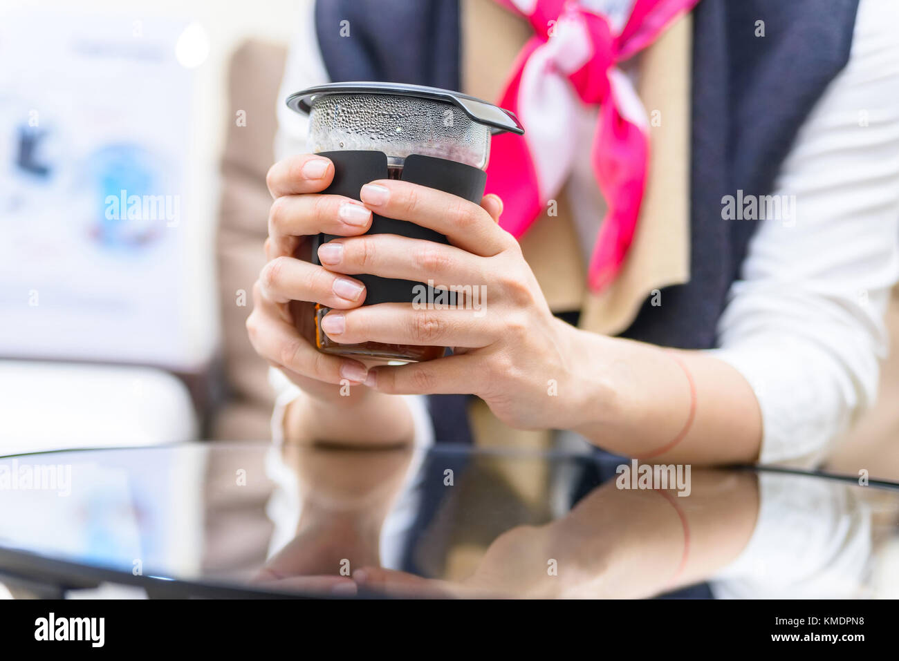 Female hands hold a cup of tea Stock Photo - Alamy