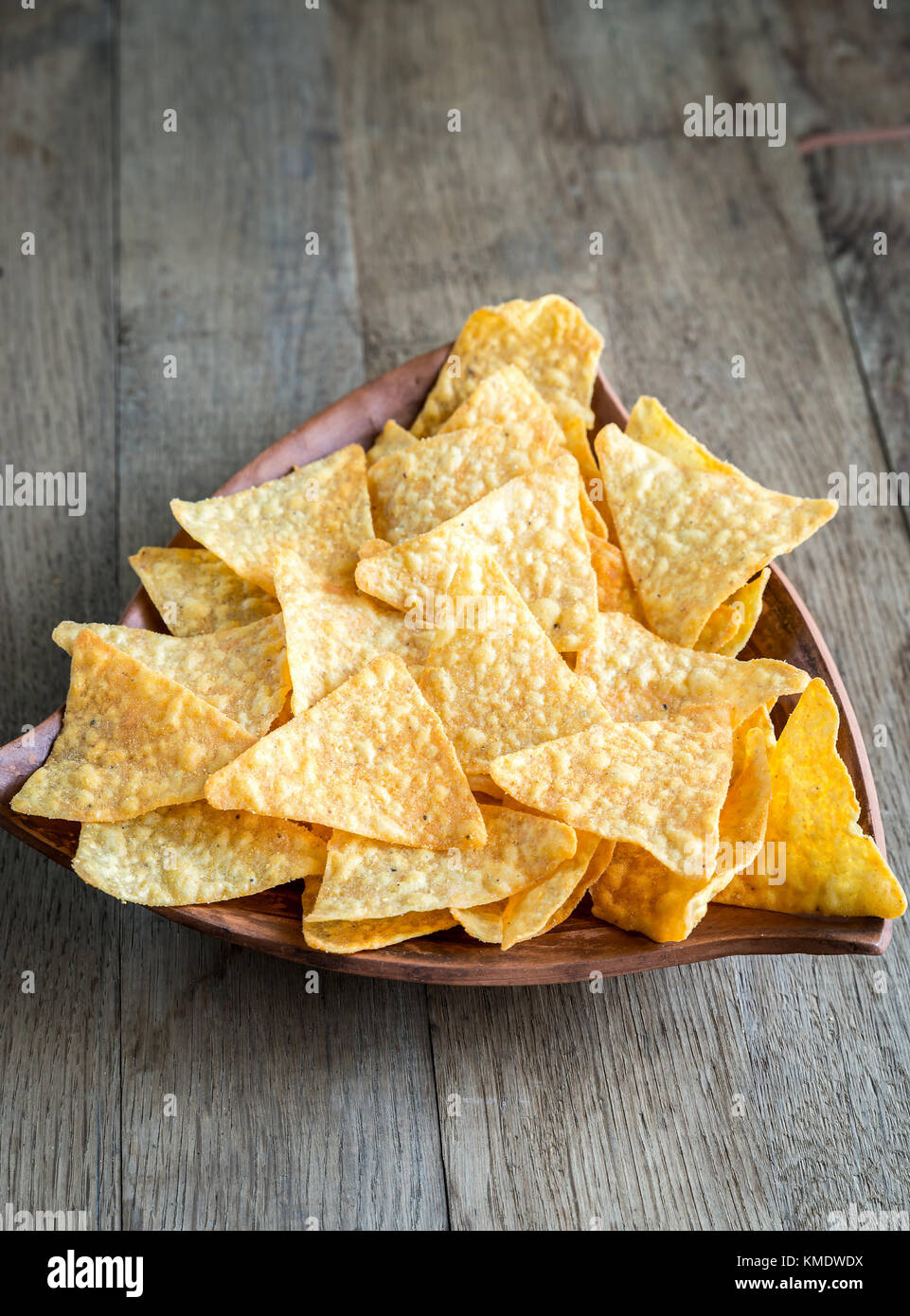 Cheese nachos in the bowl Stock Photo - Alamy