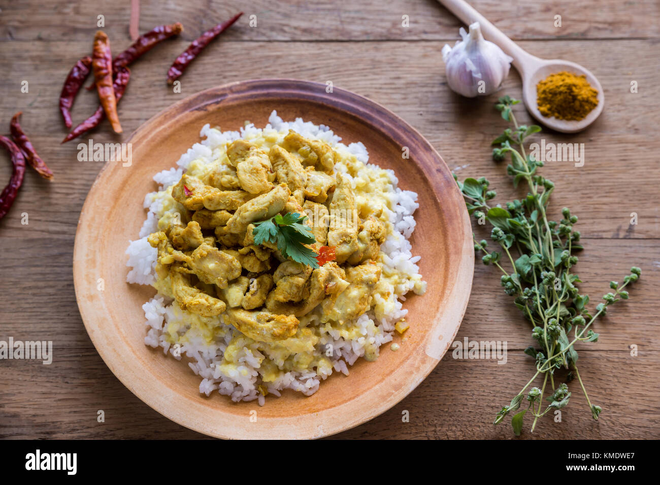 Indian chicken curry with white rice Stock Photo - Alamy
