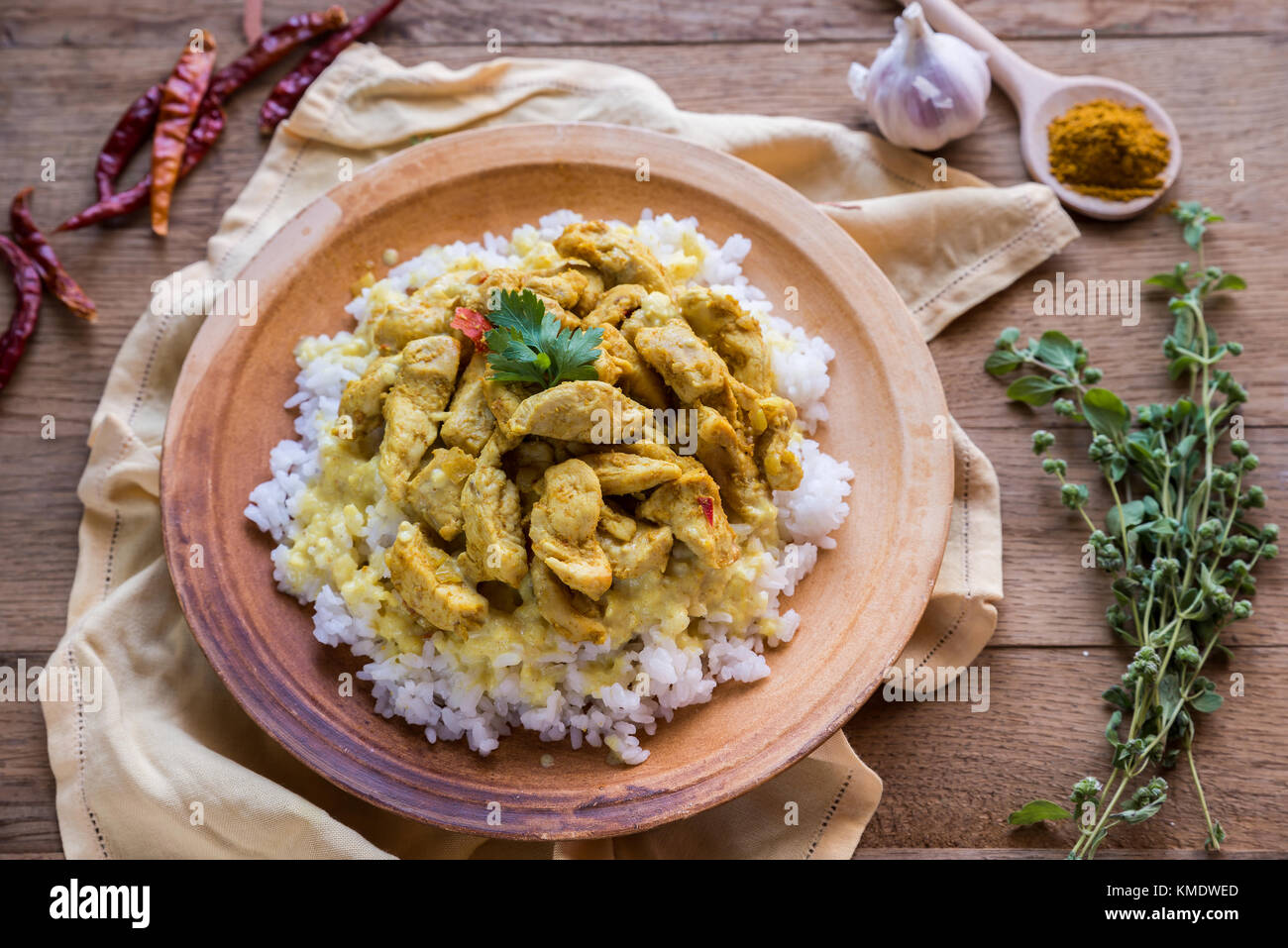 Indian chicken curry with white rice Stock Photo - Alamy
