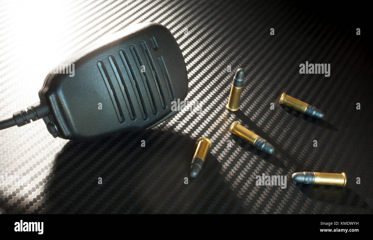 Police microphone with five rim fire cartridges Stock Photo - Alamy
