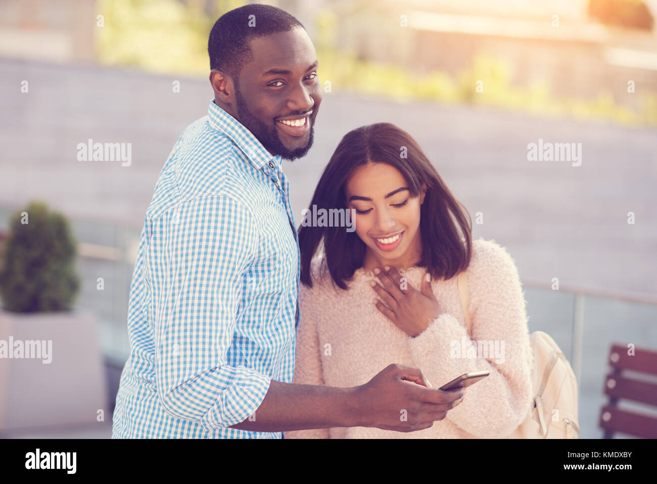 Delighted handsome man looking at you Stock Photo - Alamy