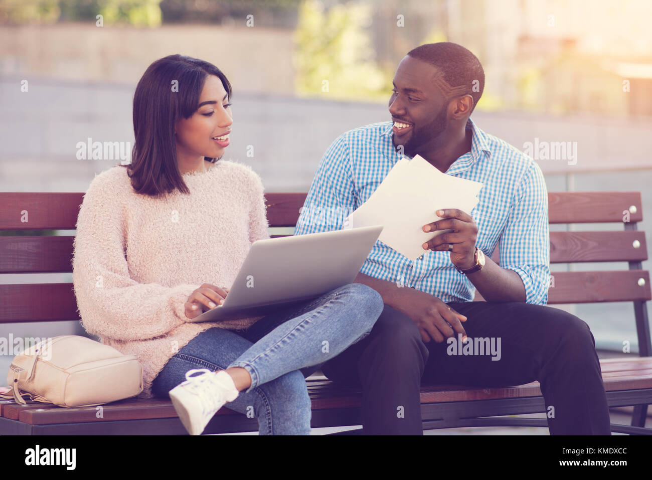 Positive colleagues talking hi-res stock photography and images - Alamy