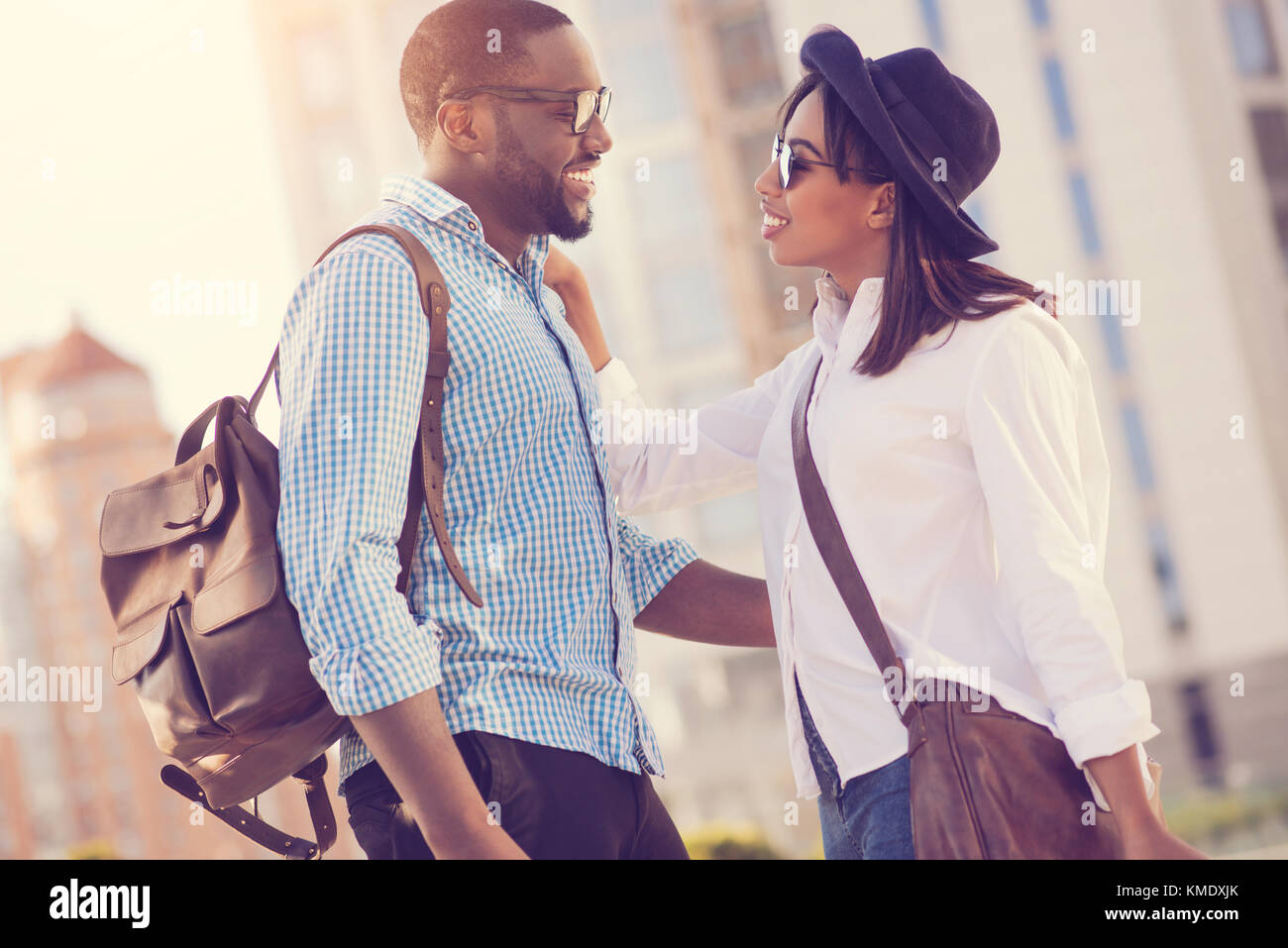 Positive cheerful couple looking at each other Stock Photo - Alamy