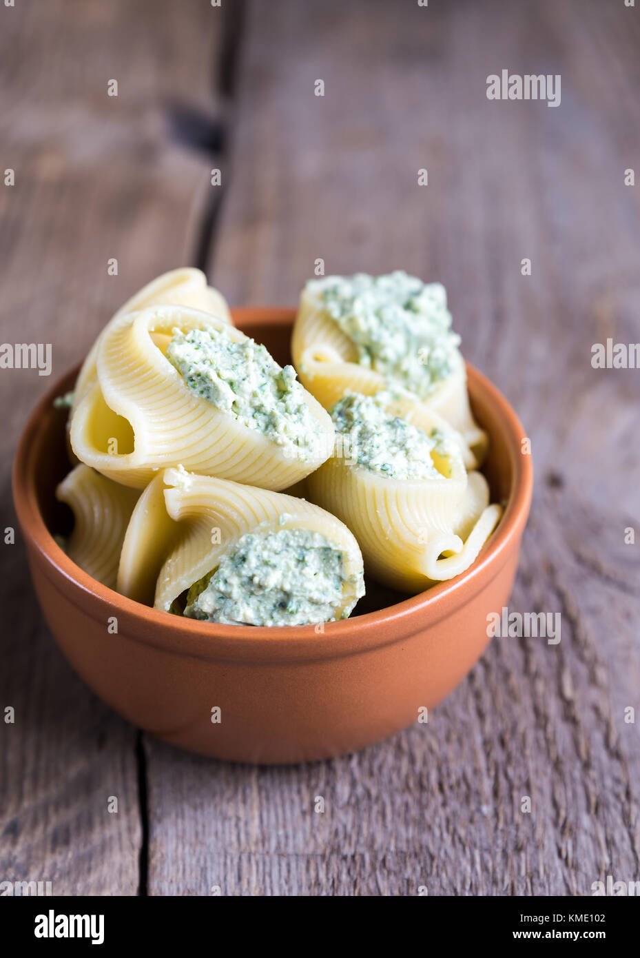 Stuffed lumaconi with cheese Stock Photo - Alamy