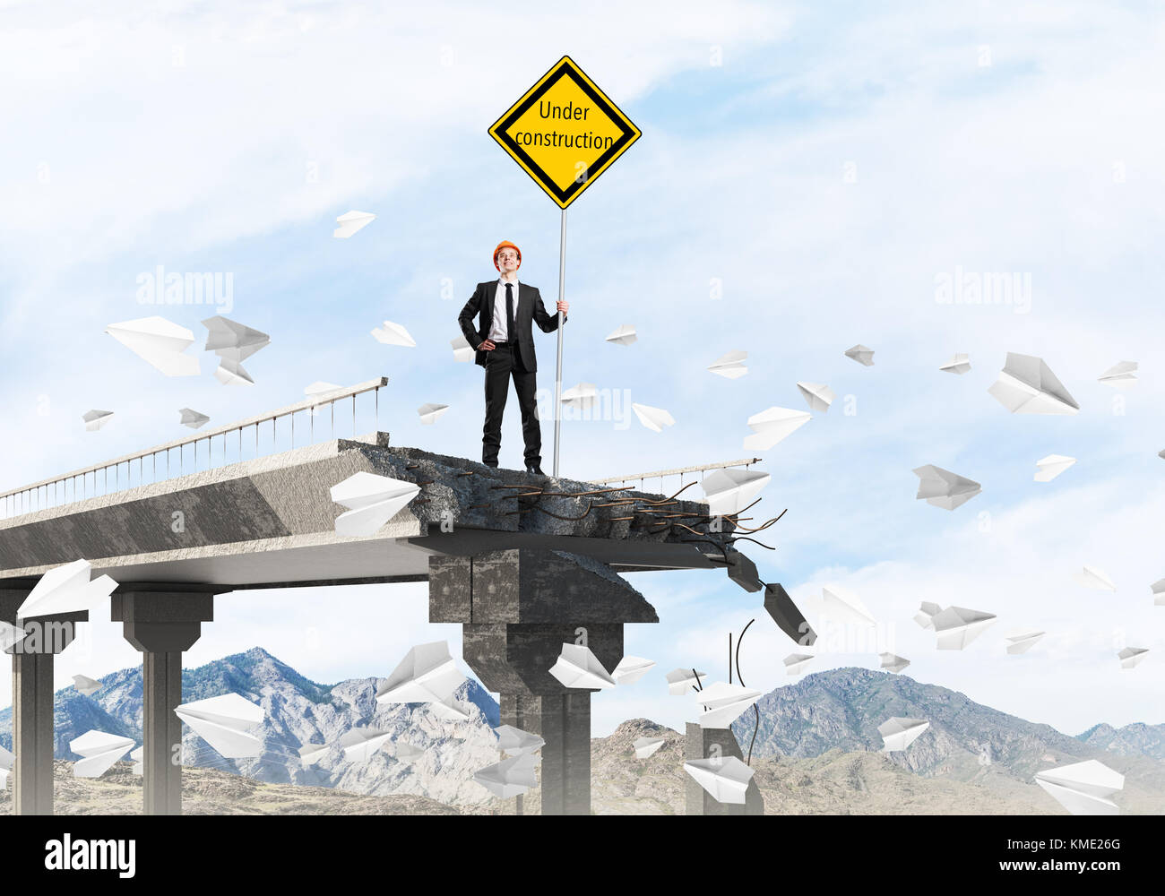 Confident engineer holding street safety sign Stock Photo - Alamy