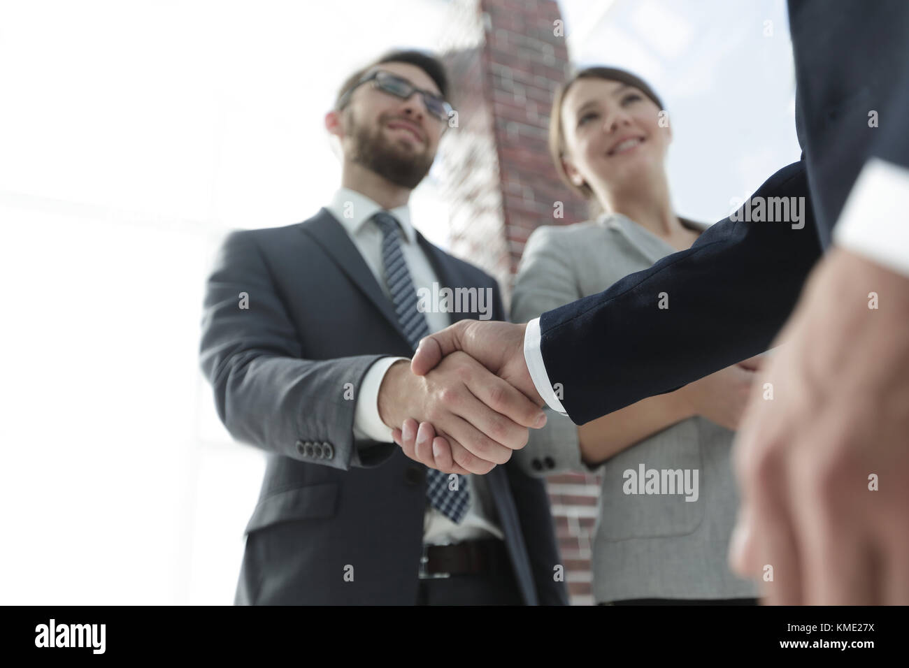 friendly handshake of business people Stock Photo - Alamy