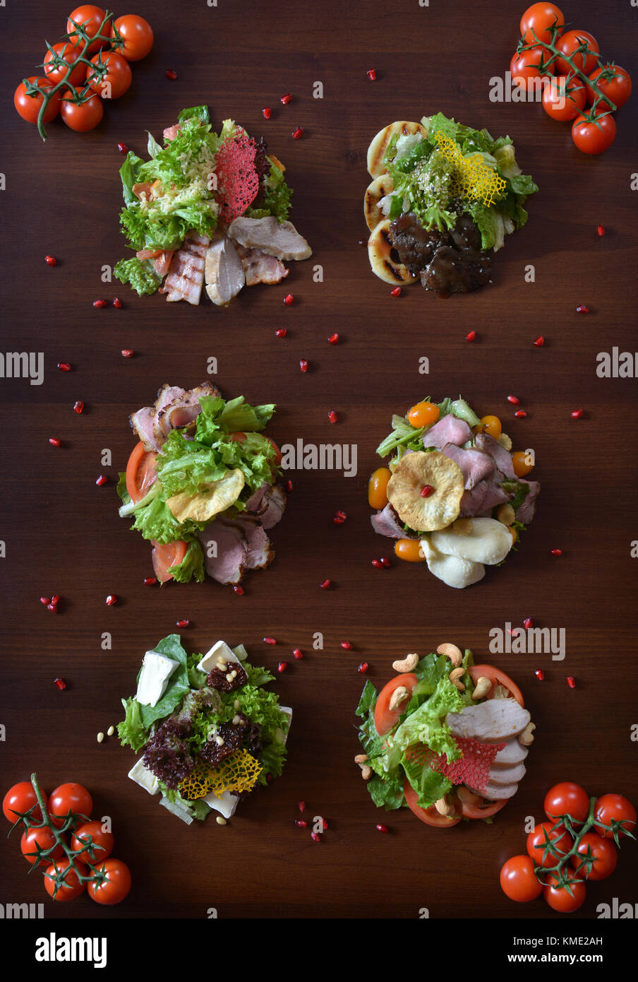 Exquisite food on a dark wooden wenge background. Gourmet Restaurant ...