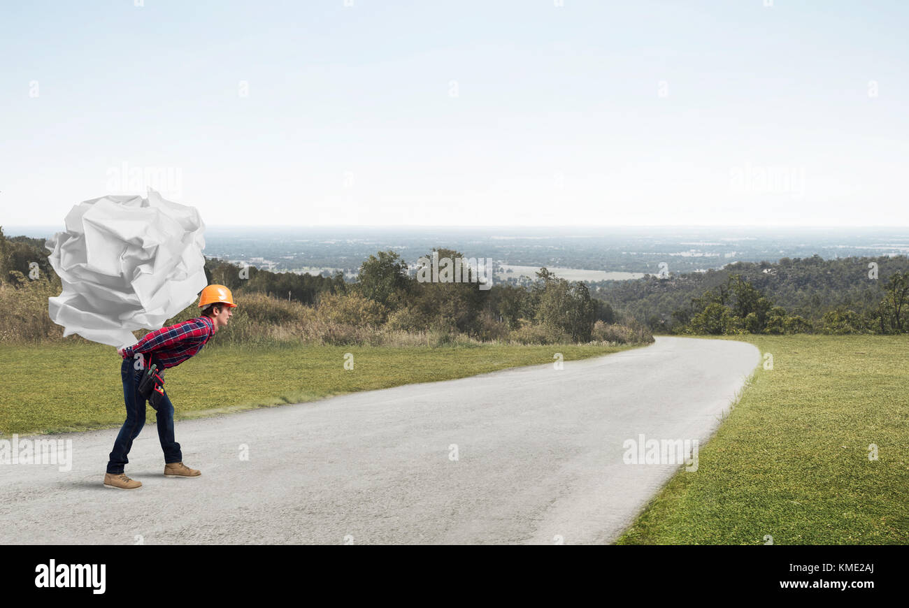 Engineer man carry load Stock Photo - Alamy