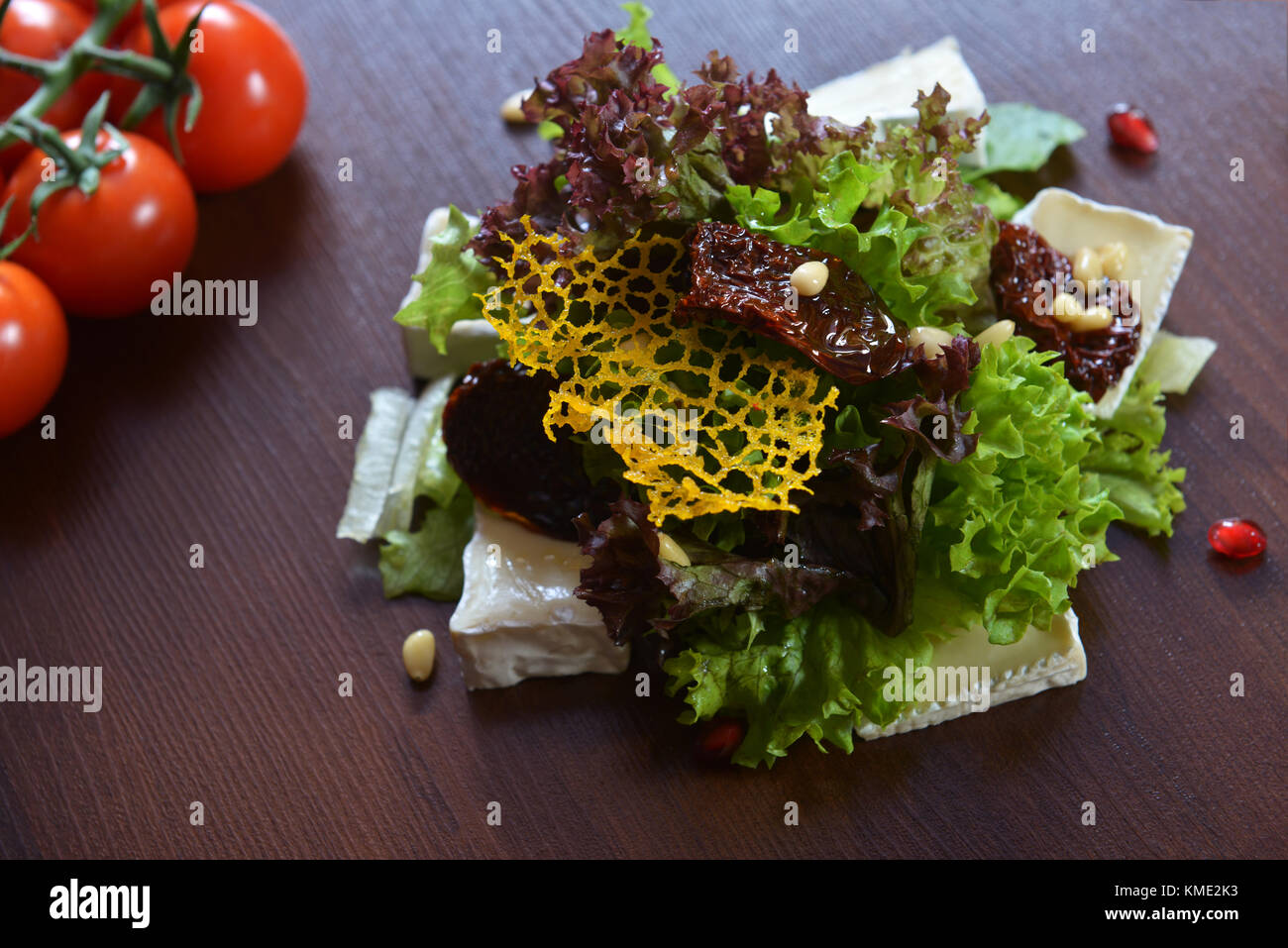Exquisite food on a dark wooden wenge background. Gourmet Restaurant ...