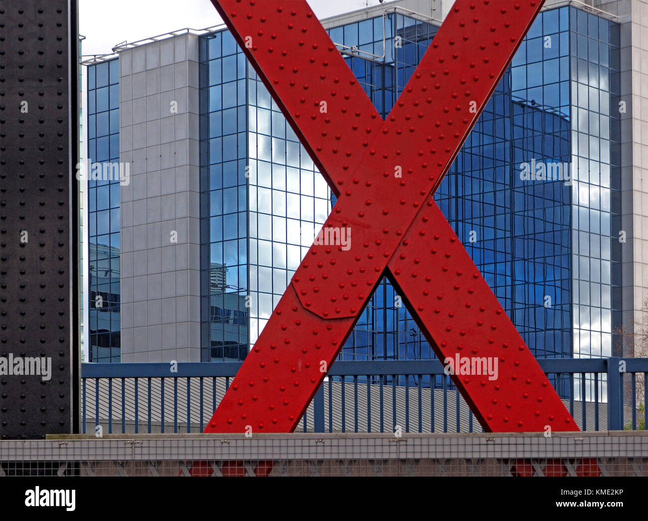 red painted girders on road bridge over the Quays at Salford Manchester ...