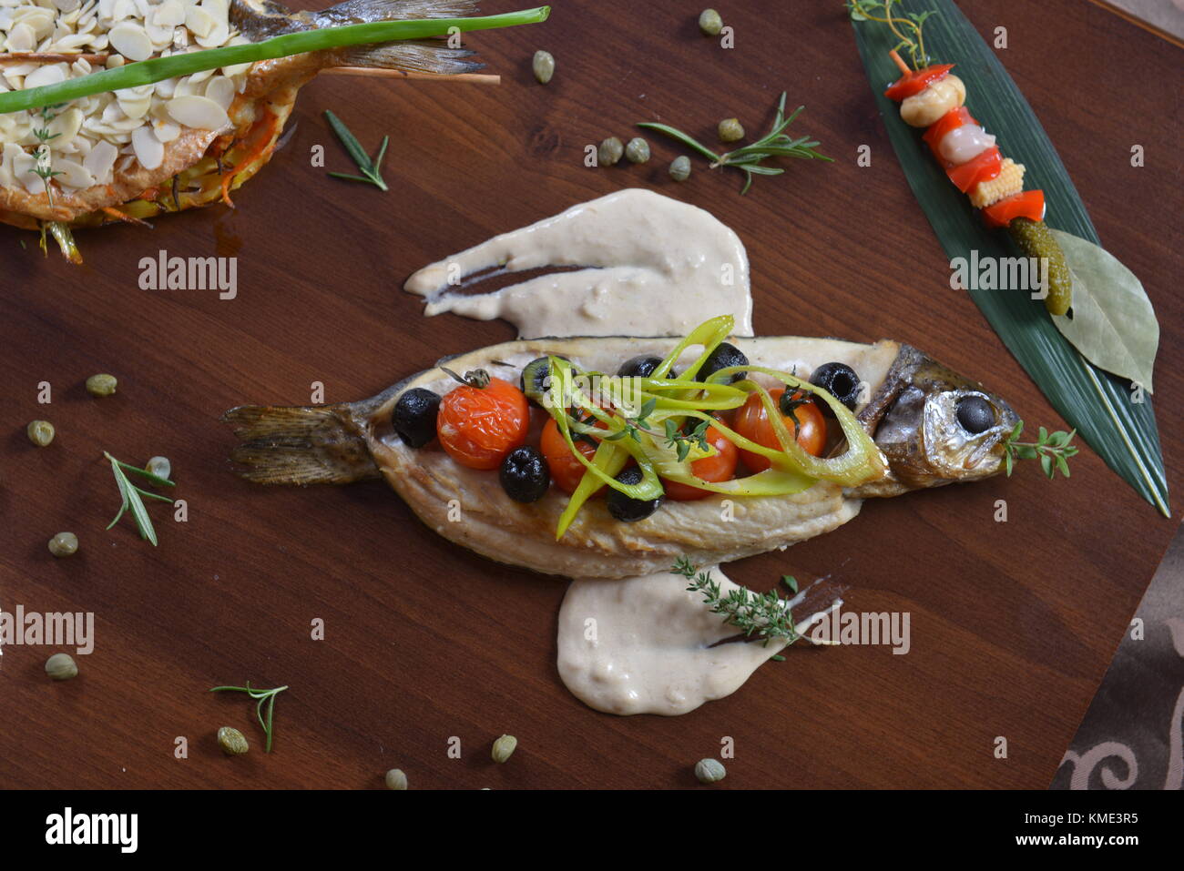 Exquisite food on a dark wooden wenge background. Gourmet Restaurant ...