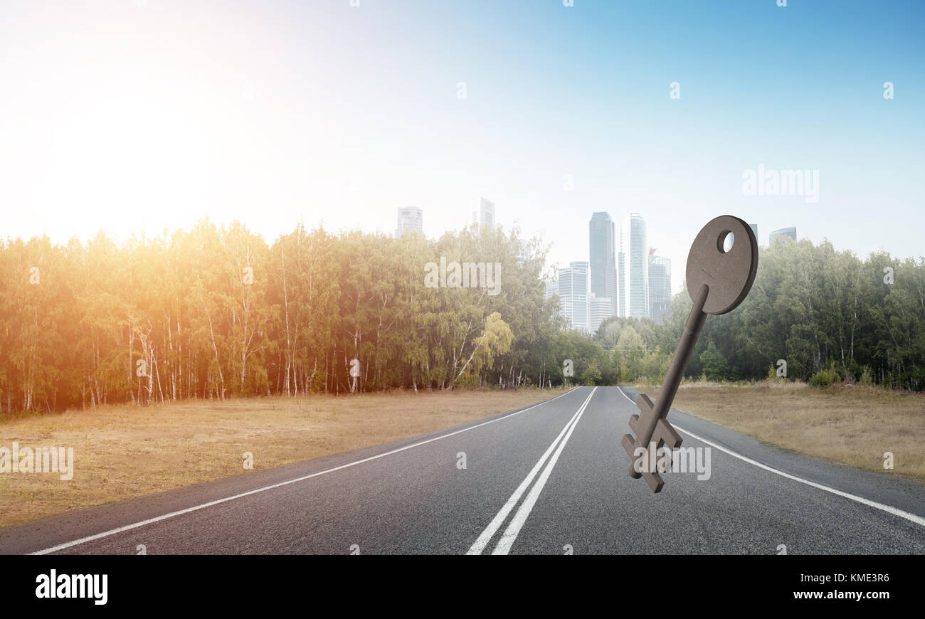Conceptual background image of concrete key sign on asphalt road Stock ...