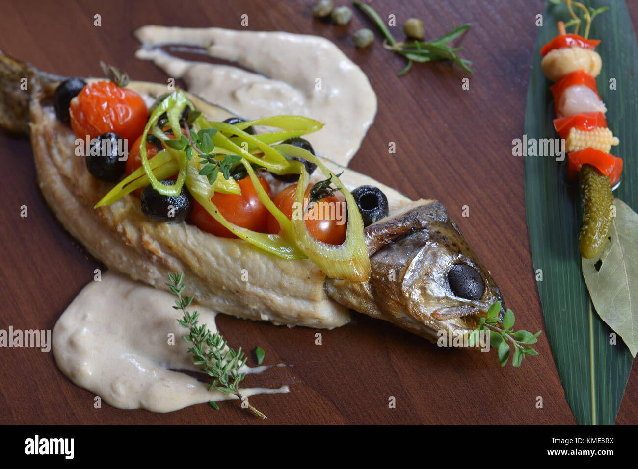 Exquisite food on a dark wooden wenge background. Gourmet Restaurant ...