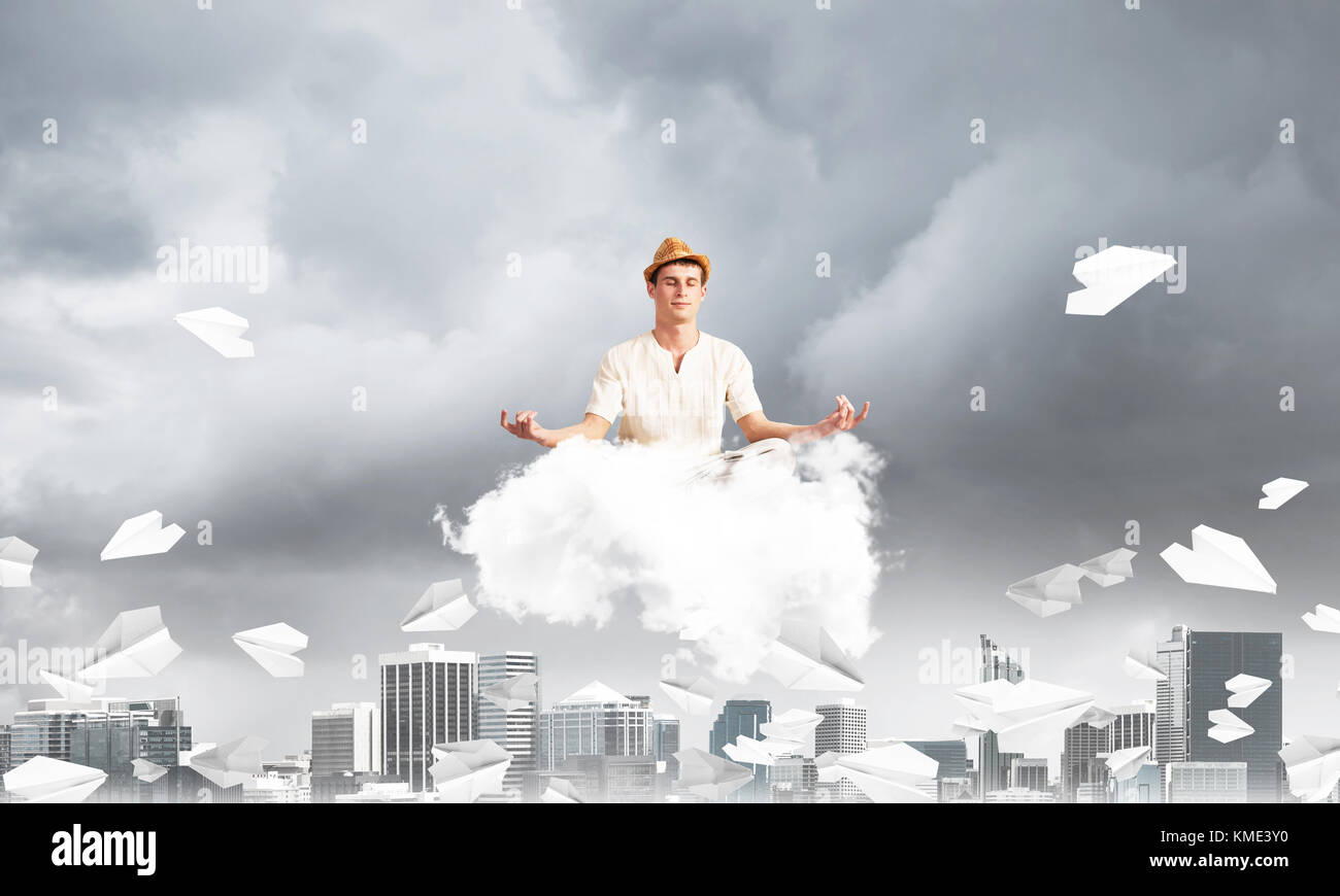 Young man keeping mind conscious Stock Photo - Alamy