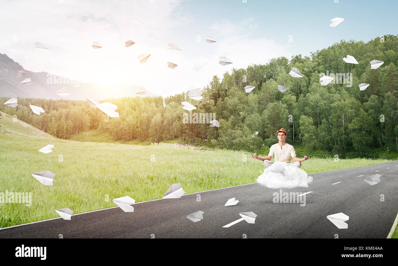 Young man keeping mind conscious Stock Photo - Alamy