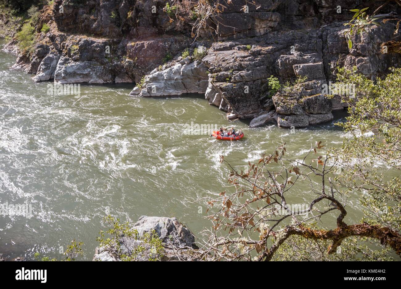 View of boaters rafting down the Rogue River from the Rainie Falls ...