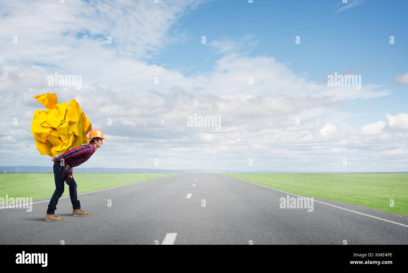Engineer man carry load Stock Photo - Alamy