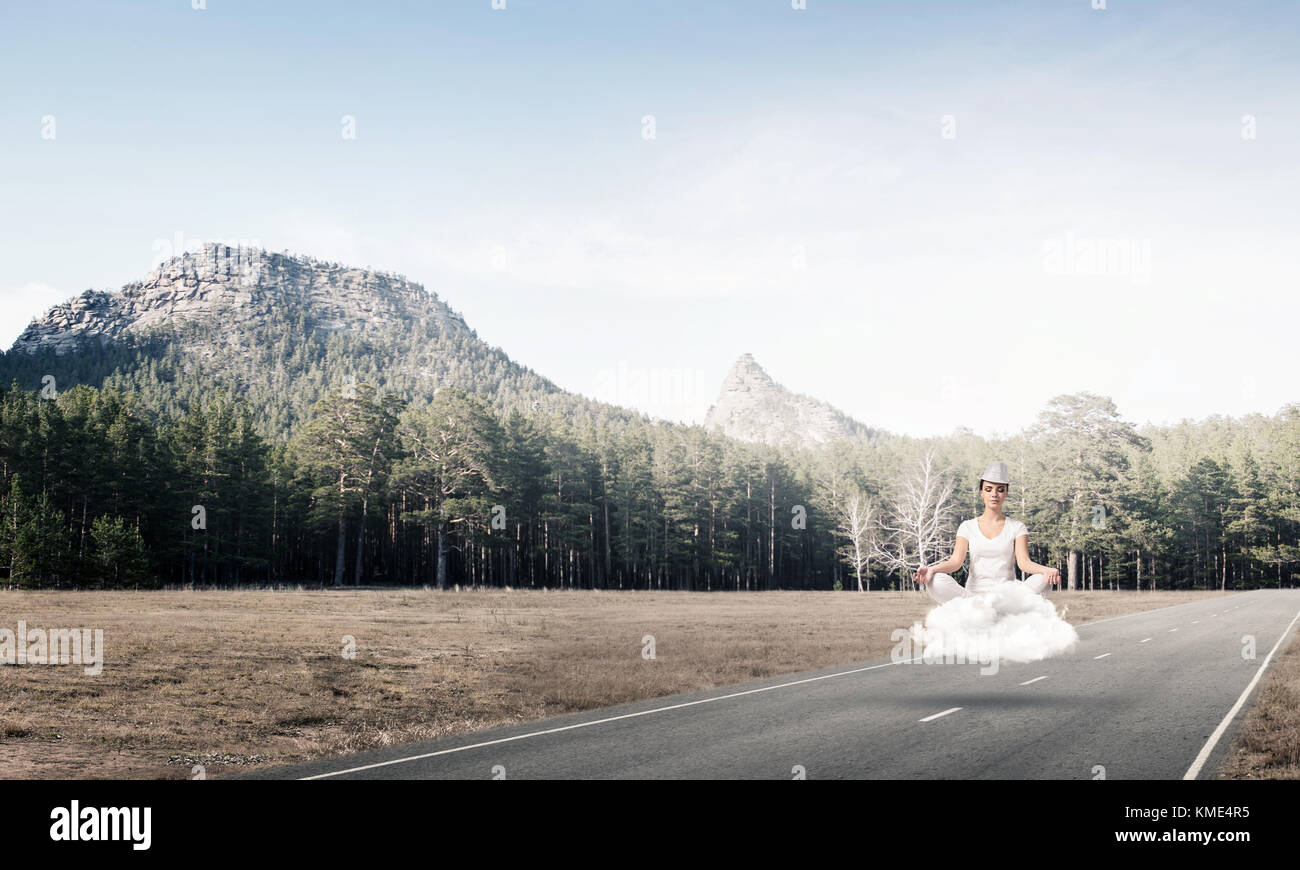 Young woman keeping mind conscious Stock Photo - Alamy