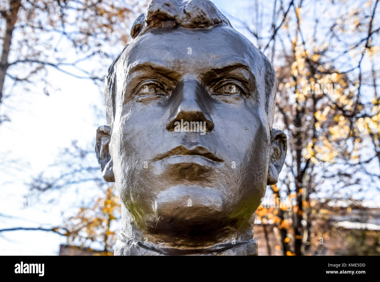 The face of the stone man. Concrete soldier bust covered with paint ...