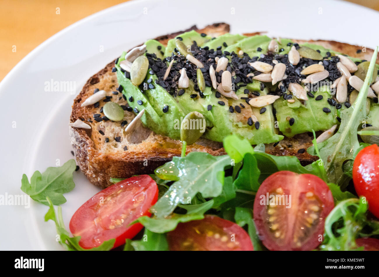 Avocado on Toast with Side Salad Stock Photo - Alamy