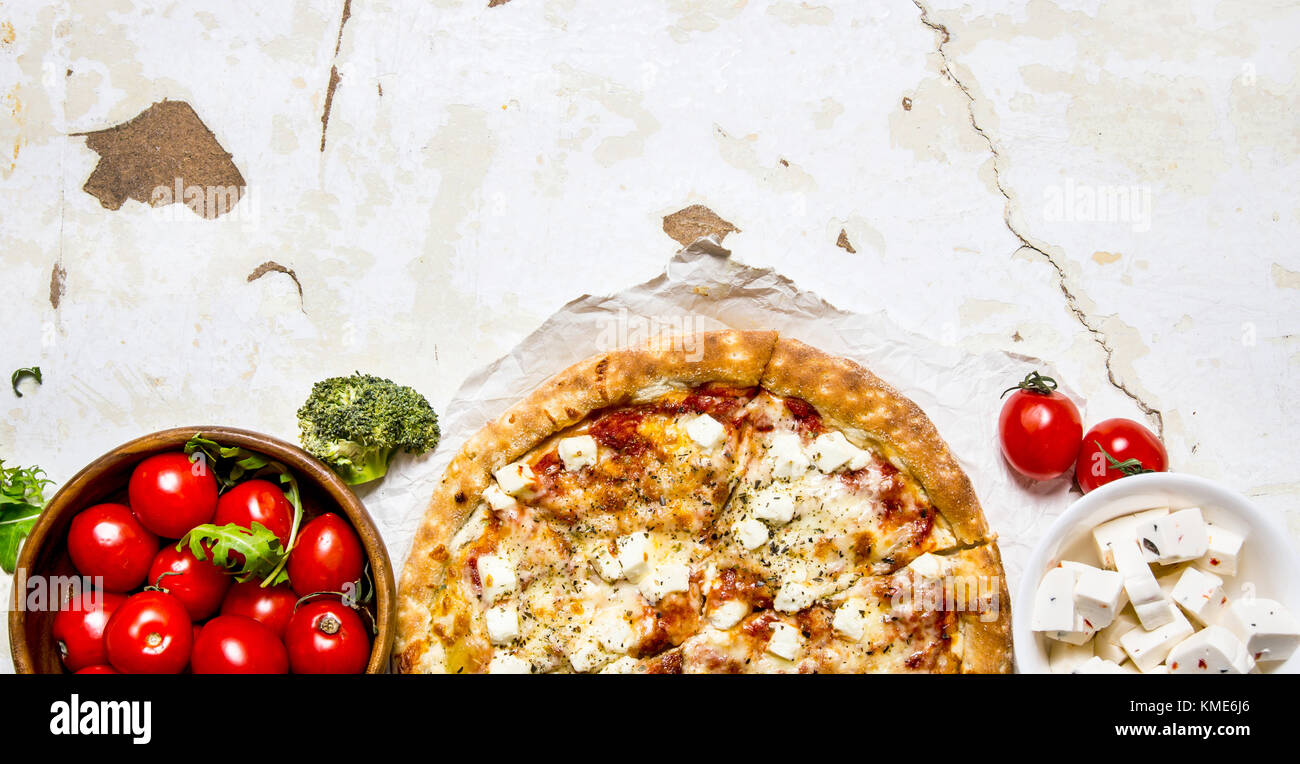 Fresh cheese pizza top view. On the rustic background. Top view Stock ...