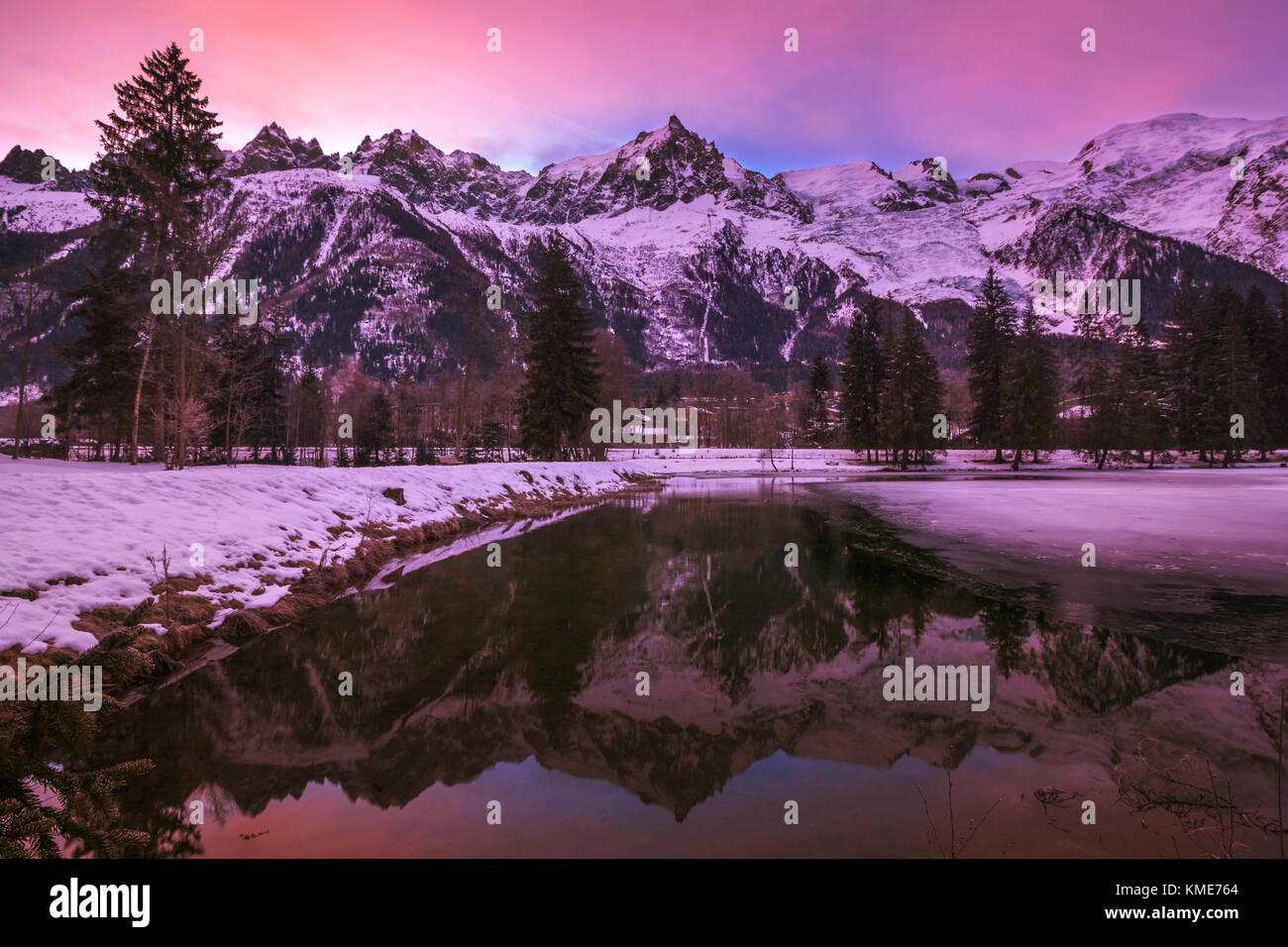 Winter scene of Mont Blanc and French Alps with a reflection on icy ...