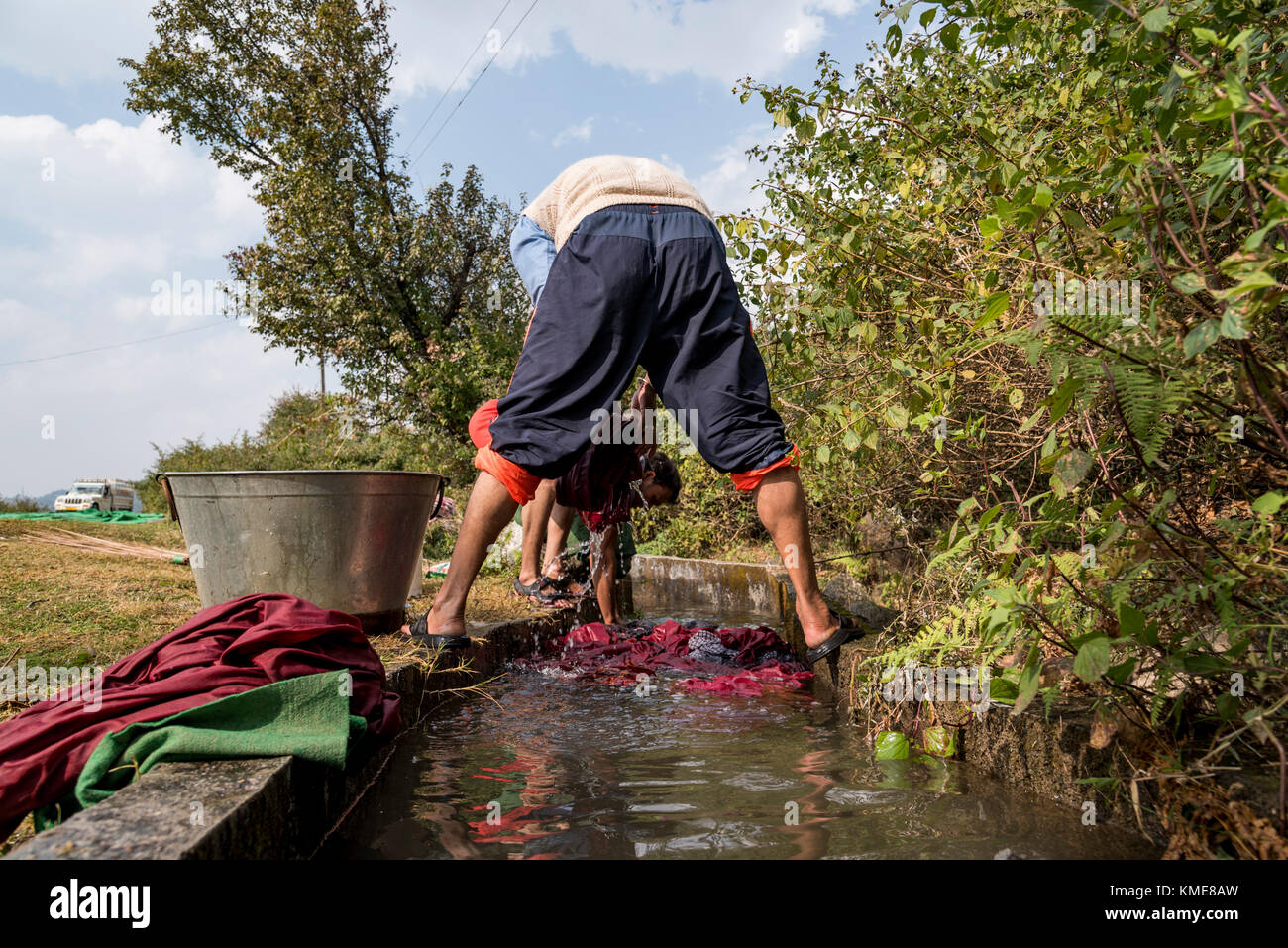 Washing clothes in a canal hi-res stock photography and images - Alamy