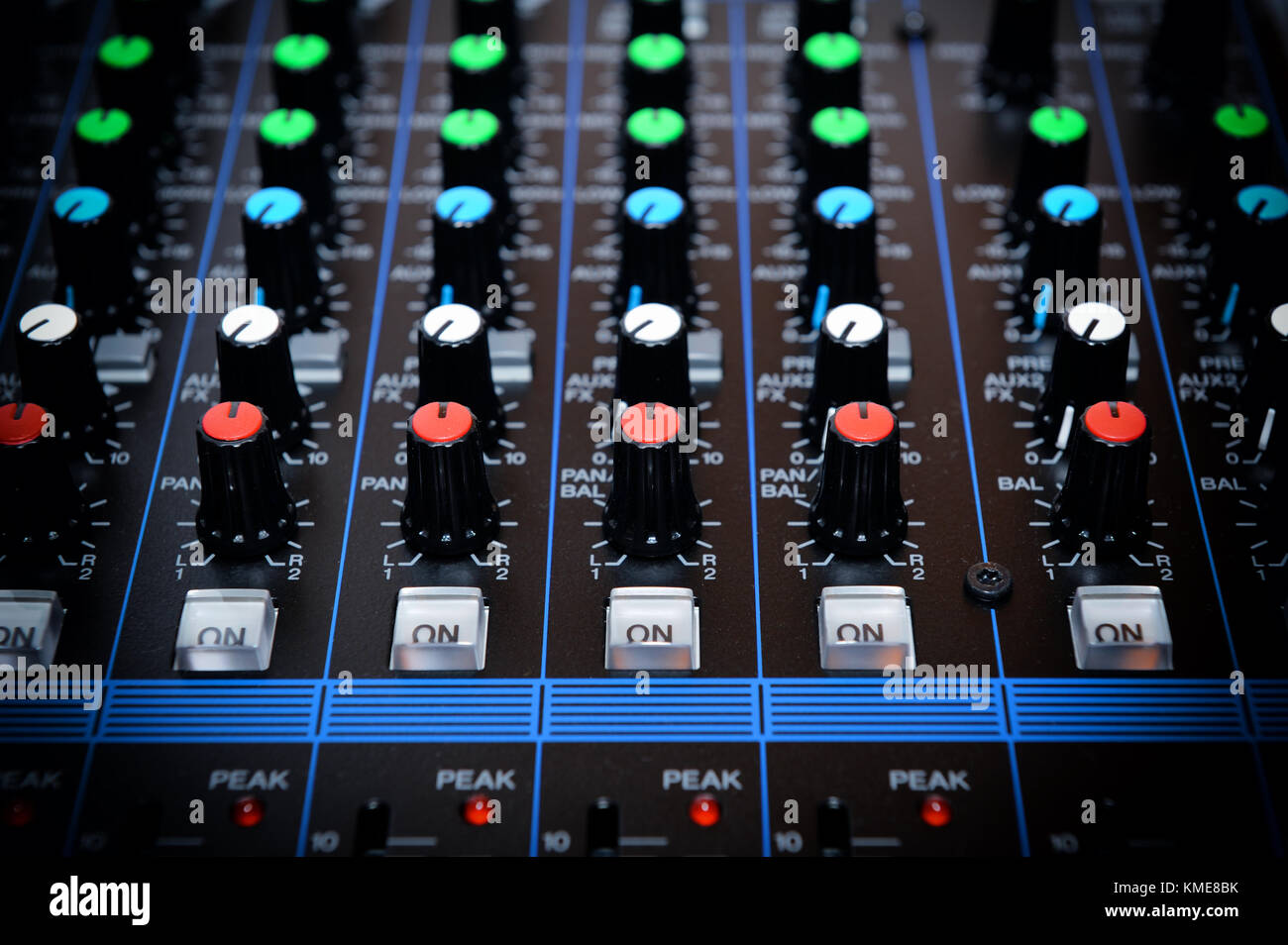 Detail of a music mixer desk with various knobs Stock Photo - Alamy